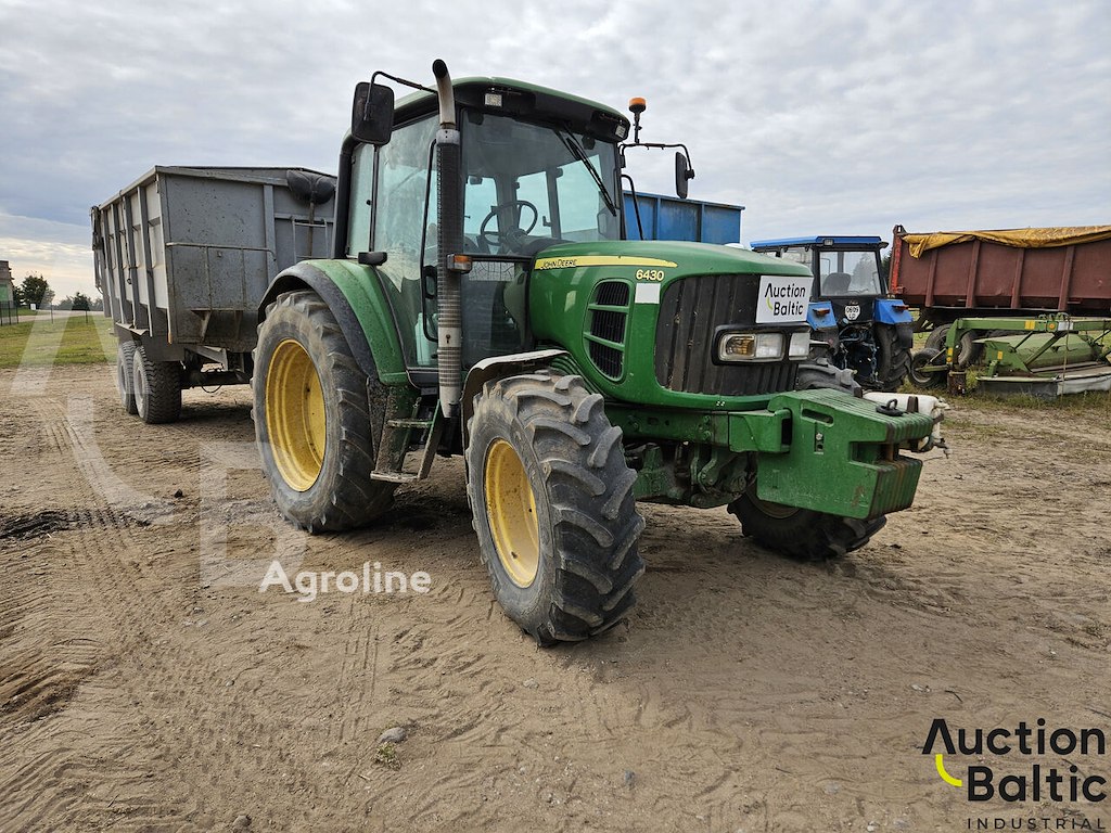 Prodaje se John Deere 6430 traktor točkaš na aukciji