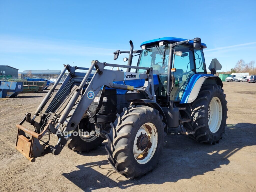 Prodaje se New Holland TM120 4WD traktor točkaš na aukciji