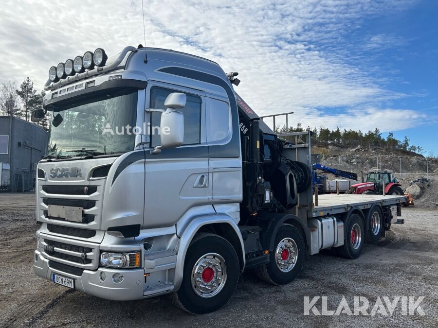 Prodaje se Scania R580 kamion s ravnom platformom na aukciji