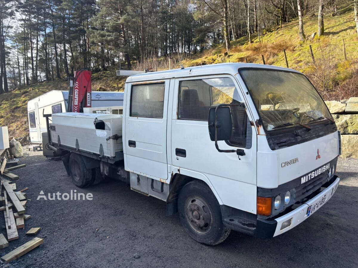 Prodaje se Mitsubishi Canter planbil med kran eu ok 03.2027 kamion s ravnom platformom na aukciji