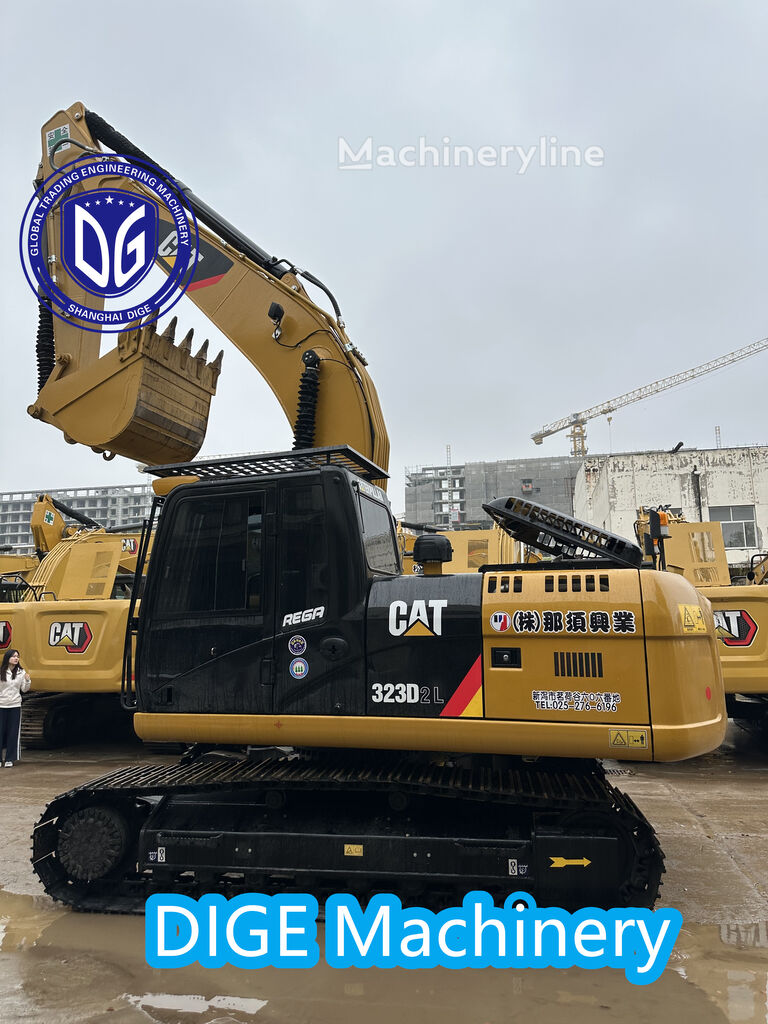Caterpillar 323DL bager guseničar