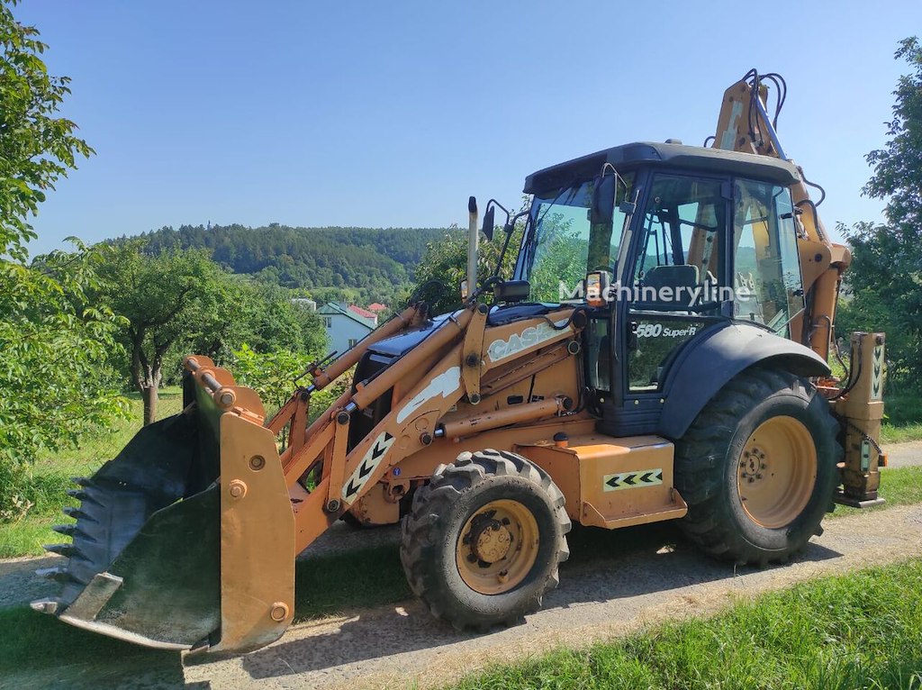 Case IH 580 SR-4PT 3850mg! Garniy stan! bager-utovarivač