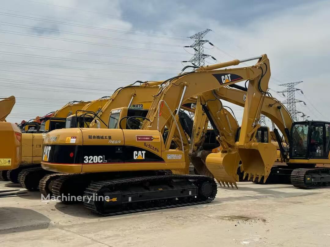 Caterpillar 320BL bager guseničar