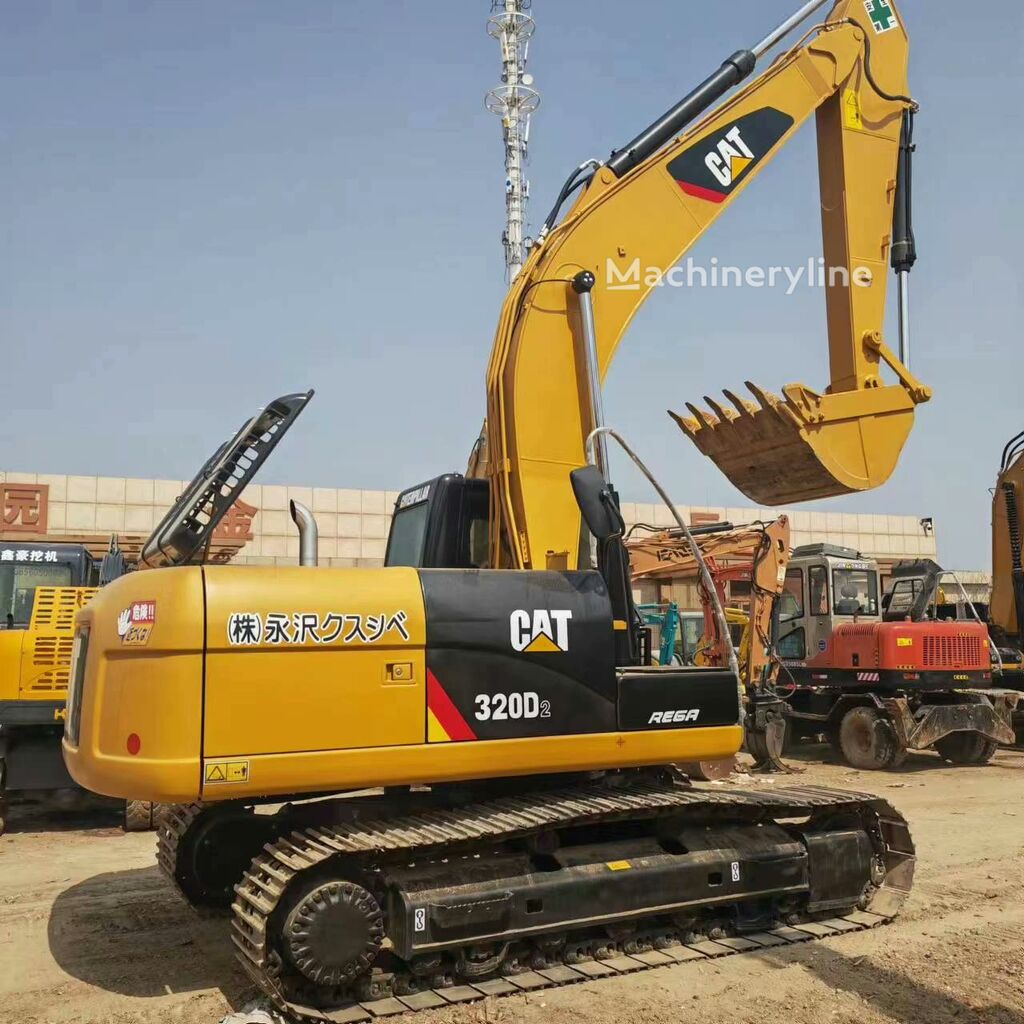 Caterpillar 320DL bager guseničar