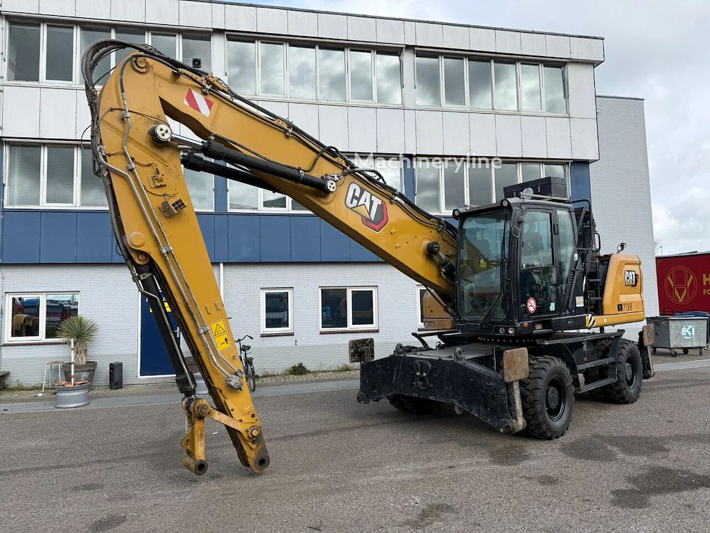 Caterpillar MH3024 bager točkaš