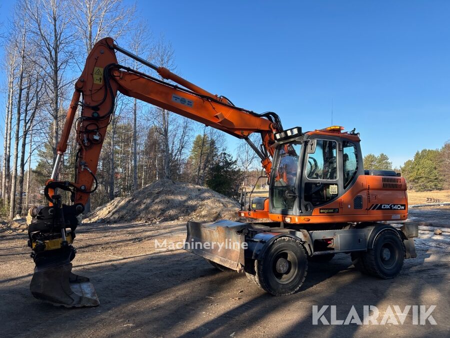Prodaje se Doosan DX140W mini bager na aukciji