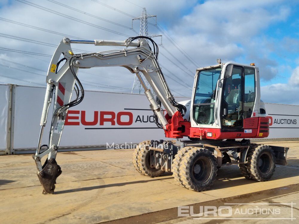 Prodaje se Takeuchi TB295W bager za pretovar na aukciji