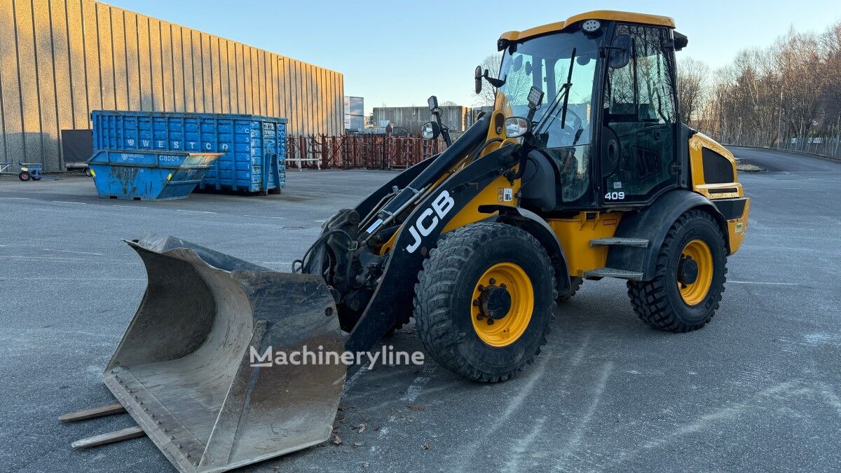 Prodaje se JCB 409 m/Pallegaffel Og Skuff prednji utovarivač na aukciji