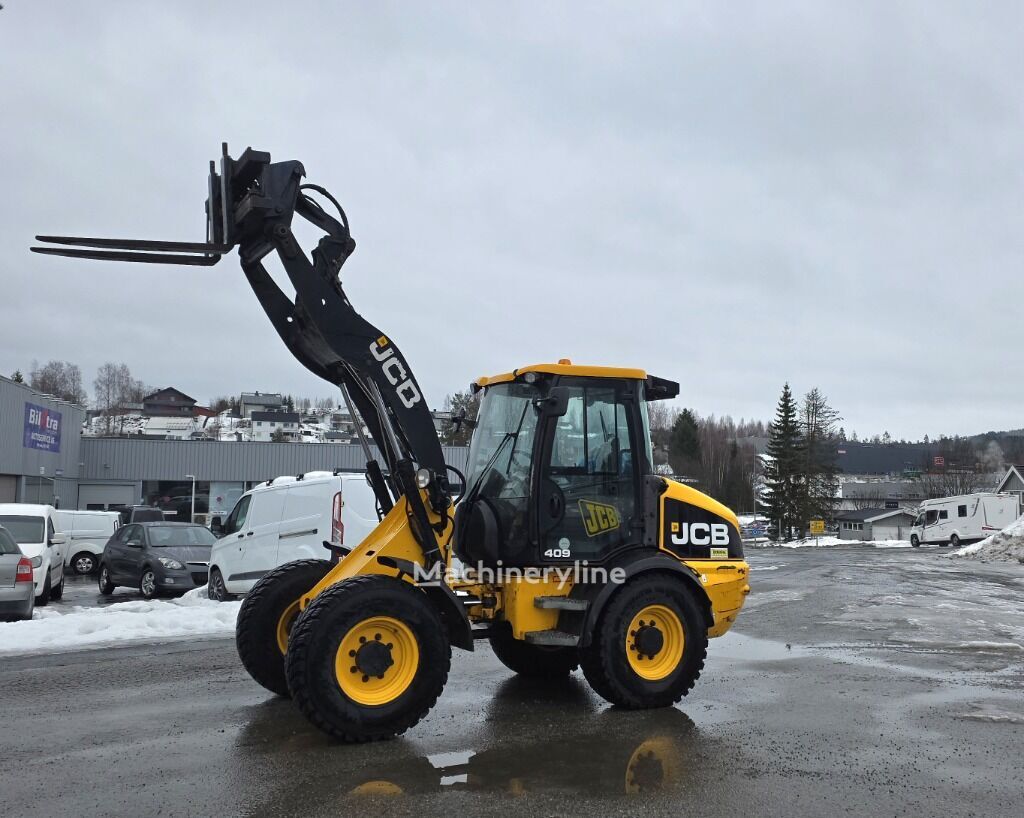 Prodaje se JCB 409 prednji utovarivač na aukciji