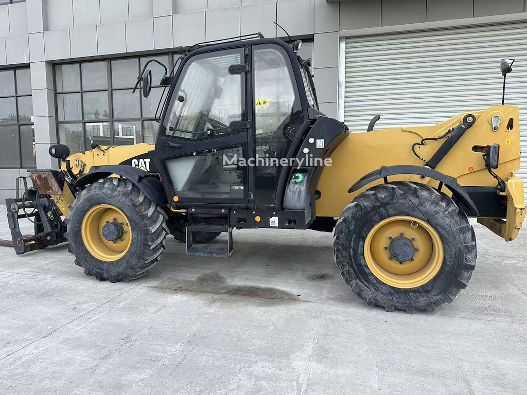 Caterpillar TH414 teleskopski utovarivač