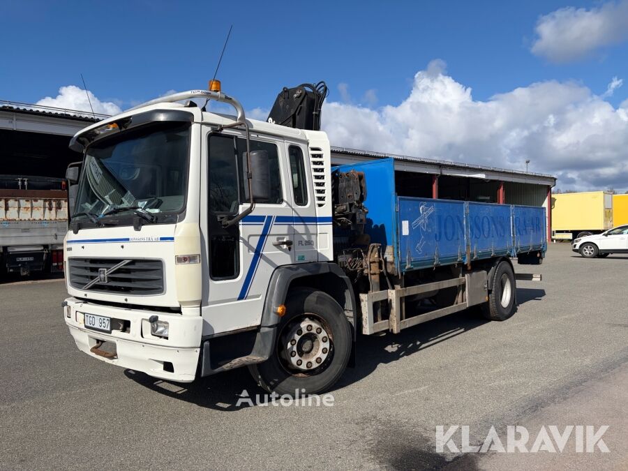 Prodaje se Volvo FL618E kamion s ravnom platformom na aukciji