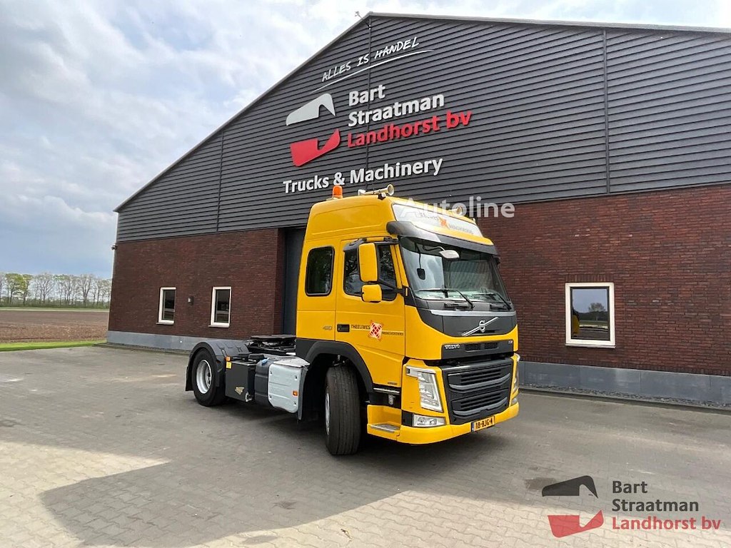 Volvo FM 410 Globetrotter 4x2 opleggertrekker met Welgro T5CDL12L 140 tegljač