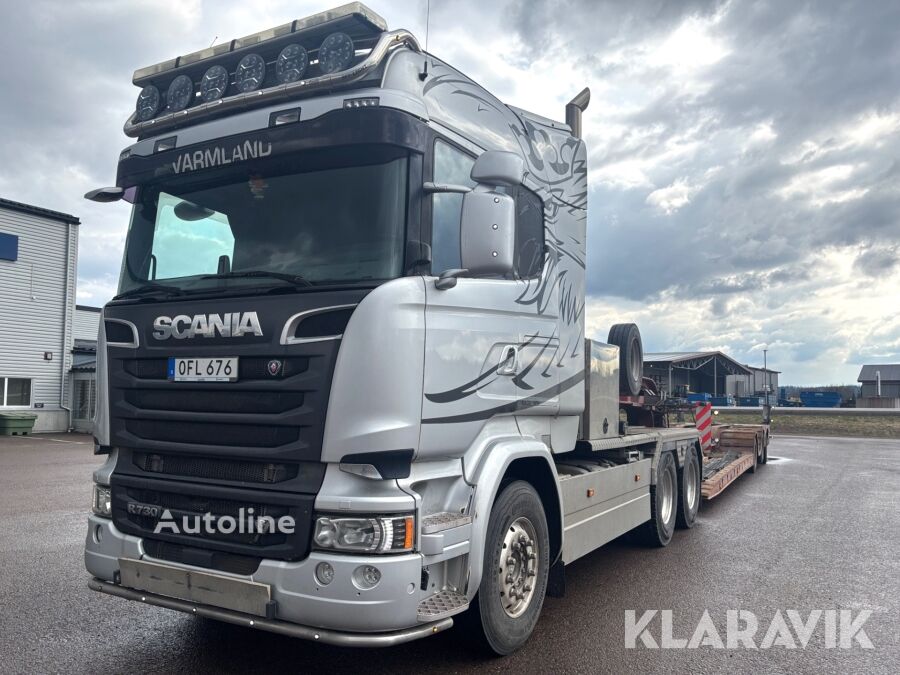 Prodaje se Scania R730 tegljač na aukciji + poluprikolica sa niskom platformom