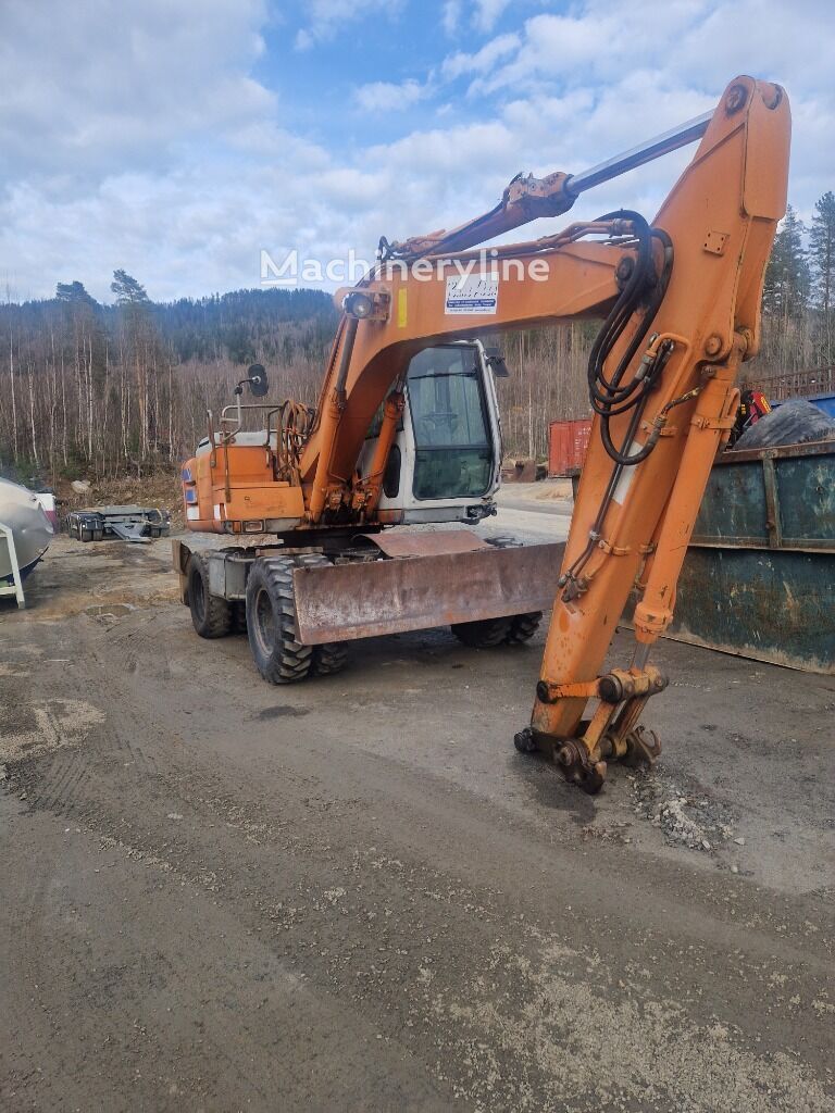 Prodaje se Fiat-Hitachi Fiat/Hitachi FH130W.3 bager točkaš na aukciji