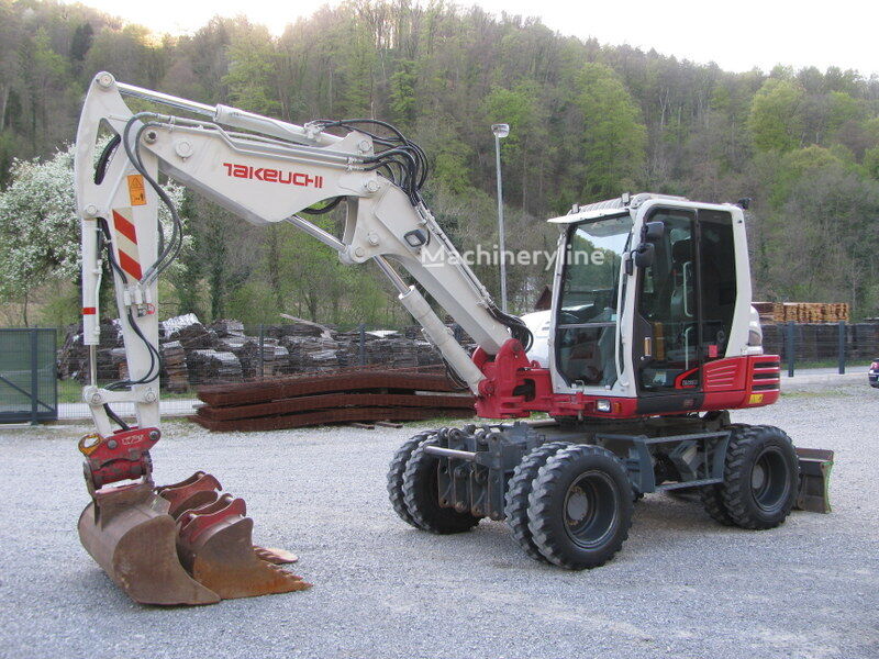 Takeuchi TB295W Powertillt bager točkaš