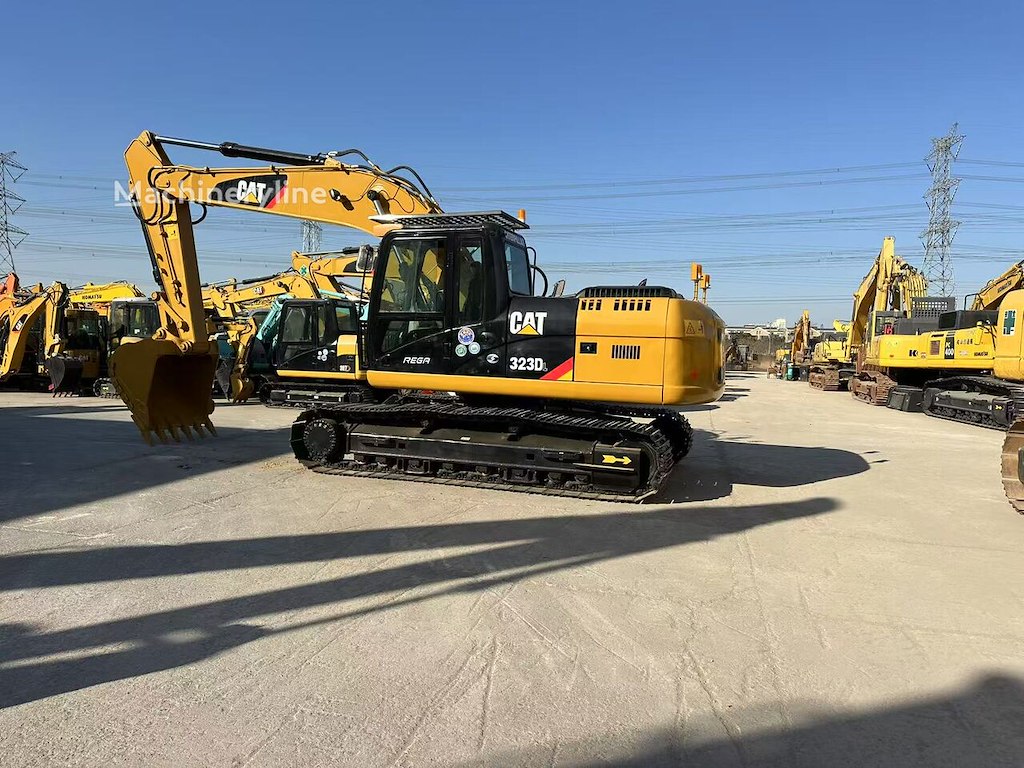 Caterpillar 323DL bager guseničar