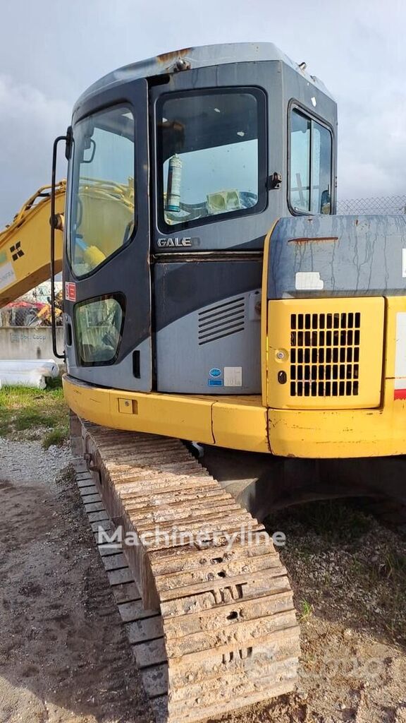 Komatsu PC128 US2 bager guseničar