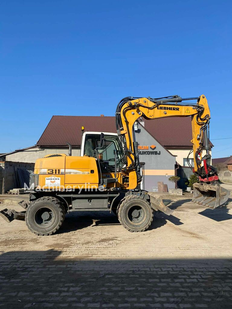 Liebherr A311 Rototilt bager točkaš