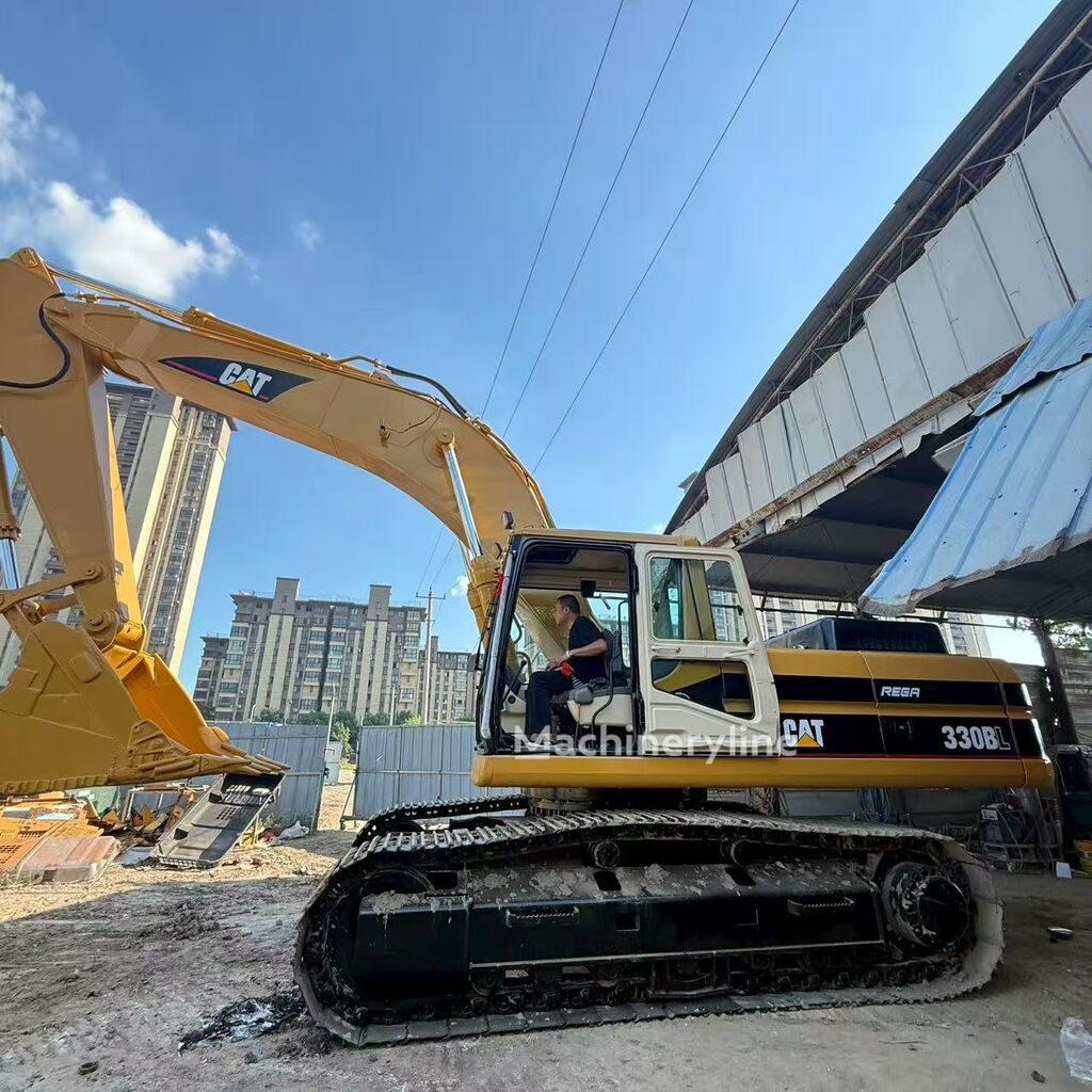 Caterpillar 330BL bager guseničar