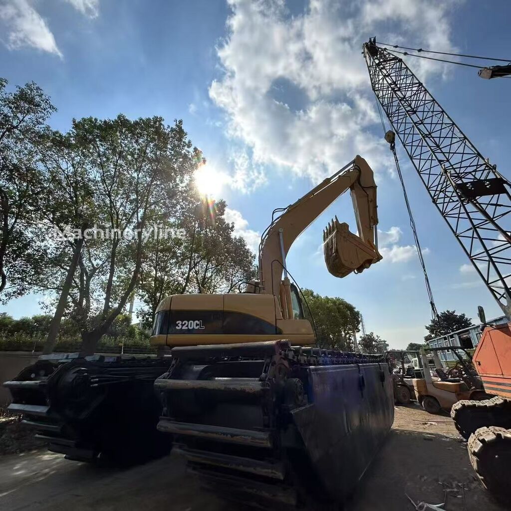 Caterpillar 320CL bager amfibija