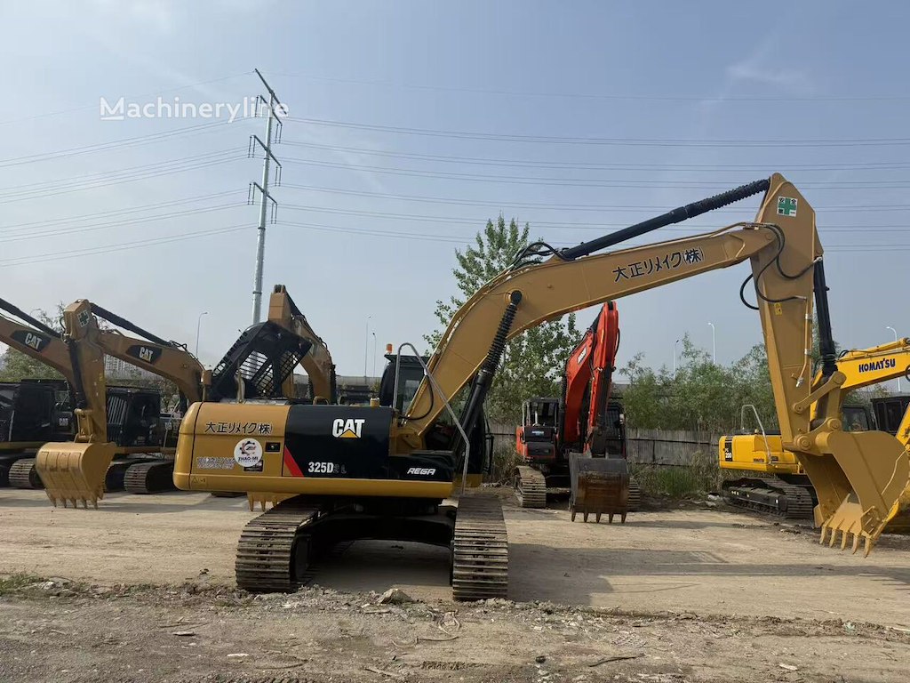 Caterpillar 325DL bager guseničar