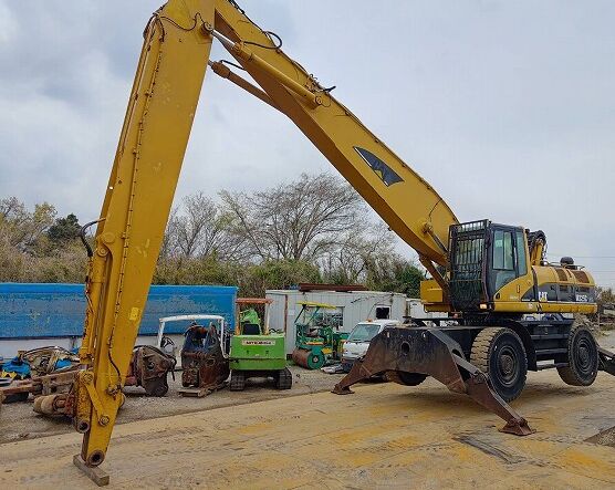 Caterpillar M325C bager za pretovar