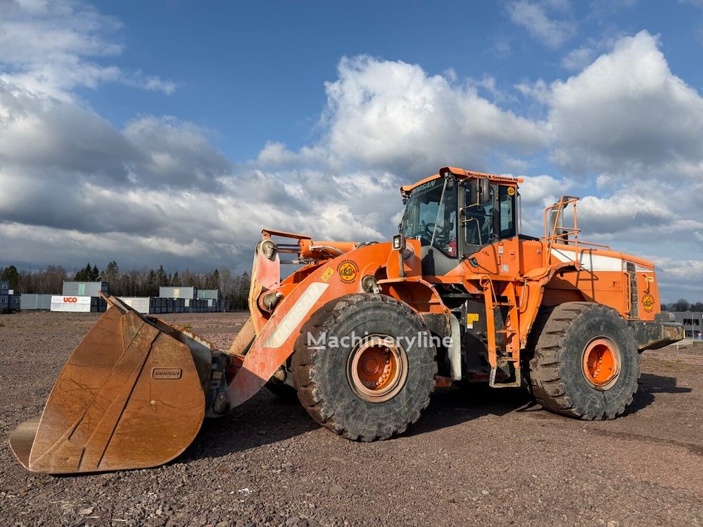 Prodaje se Doosan DL550-5 hjullaster med Gjerstad skuffe og veiesystem prednji utovarivač na aukciji