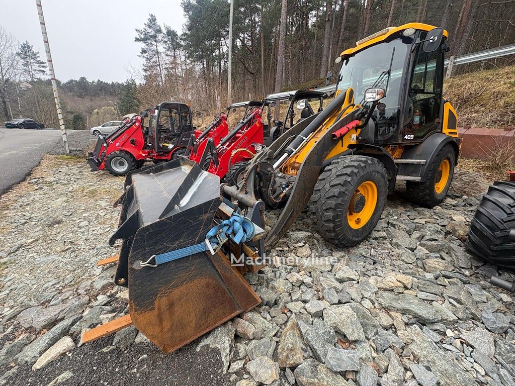 Prodaje se JCB 409 T4 Hjullaster med skuffe og pallegaffel prednji utovarivač na aukciji