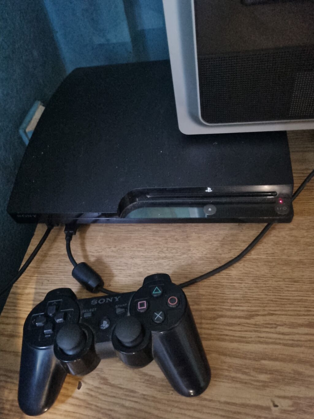 Sony PlayStation 3 Slim konzola sa originalnim DualShock 3 bežičnim
