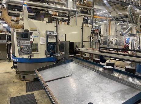 strug sa vertikalnim kupolom sa cnc Okuma LVT 400-M