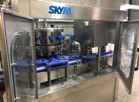 SKYM NEW Monobloc filling and capping of cans