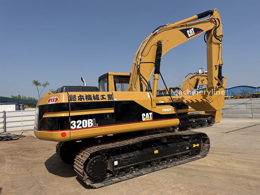 Caterpillar 320BL bager guseničar