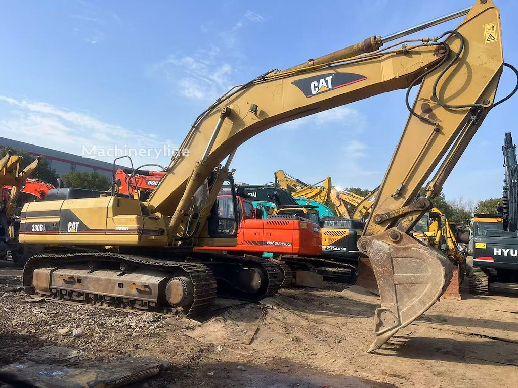 Caterpillar 330BL bager guseničar
