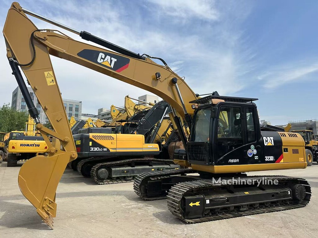 Caterpillar 323DL bager guseničar