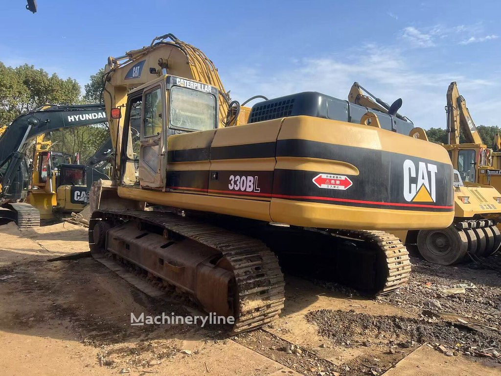 Caterpillar 330BL bager guseničar