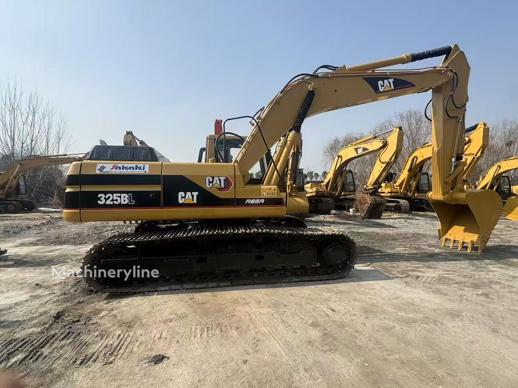 Caterpillar 325BL bager guseničar