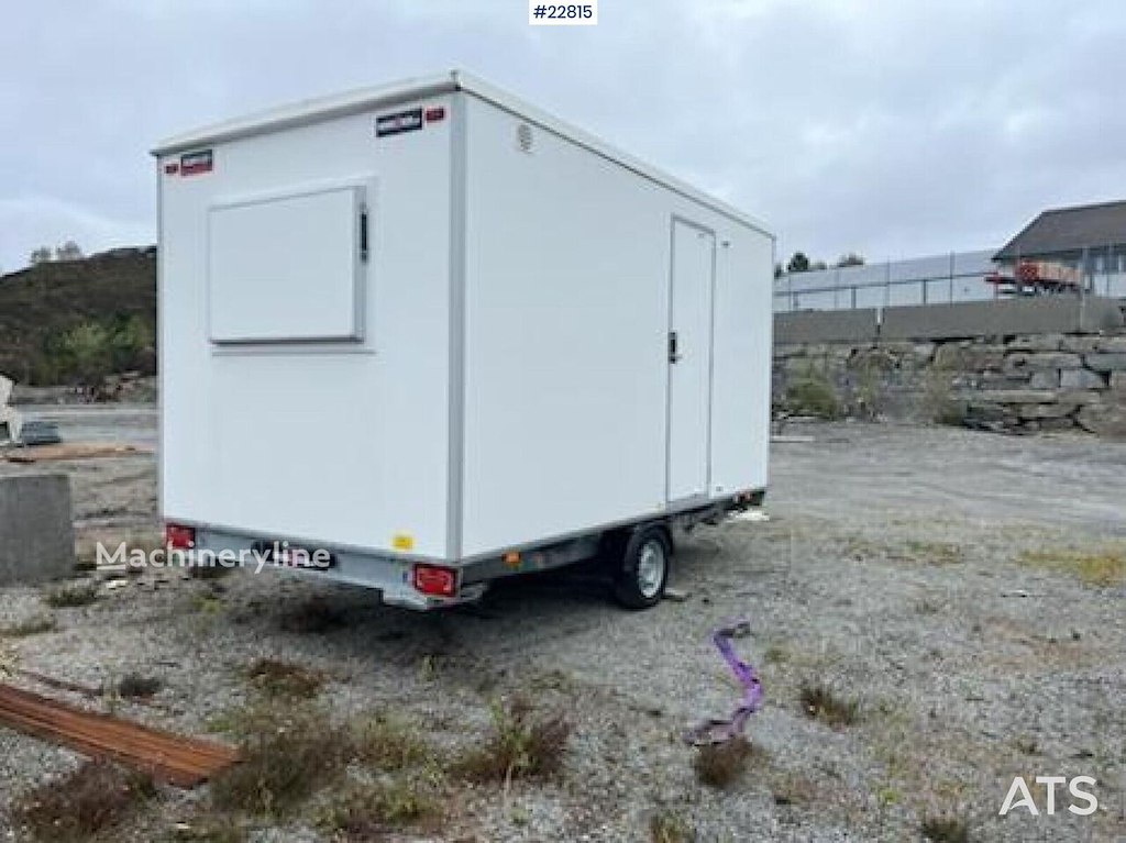 Trailer with a tank, toilet, and refrigerator stambeno-poslovni kontejner