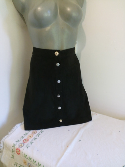 H&M crna suknja kao koza 34/36