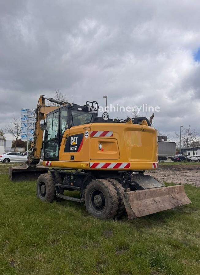 Caterpillar M315F bager točkaš