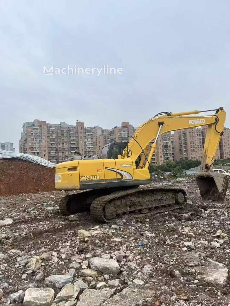 Kobelco SK210 bager guseničar