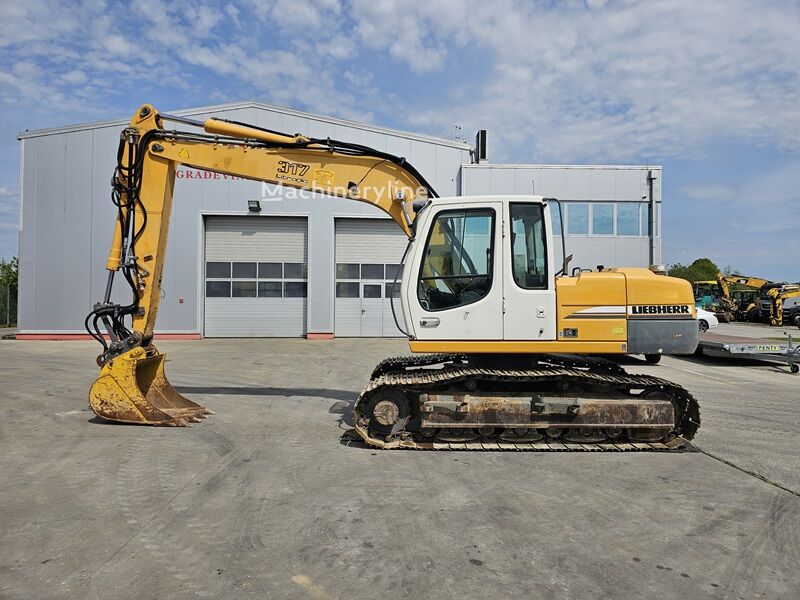 Liebherr R317 Litronic bager guseničar