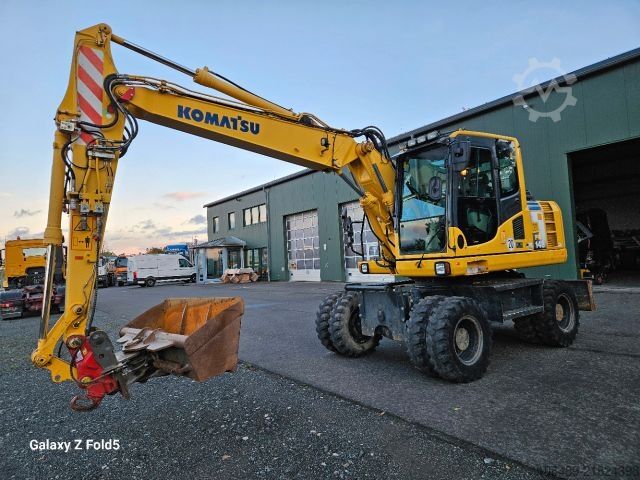 Točkaš bager
KOMATSU PW 148 - 8