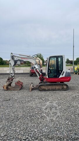 Mini bager
Takeuchi TB 235 POWERTILT