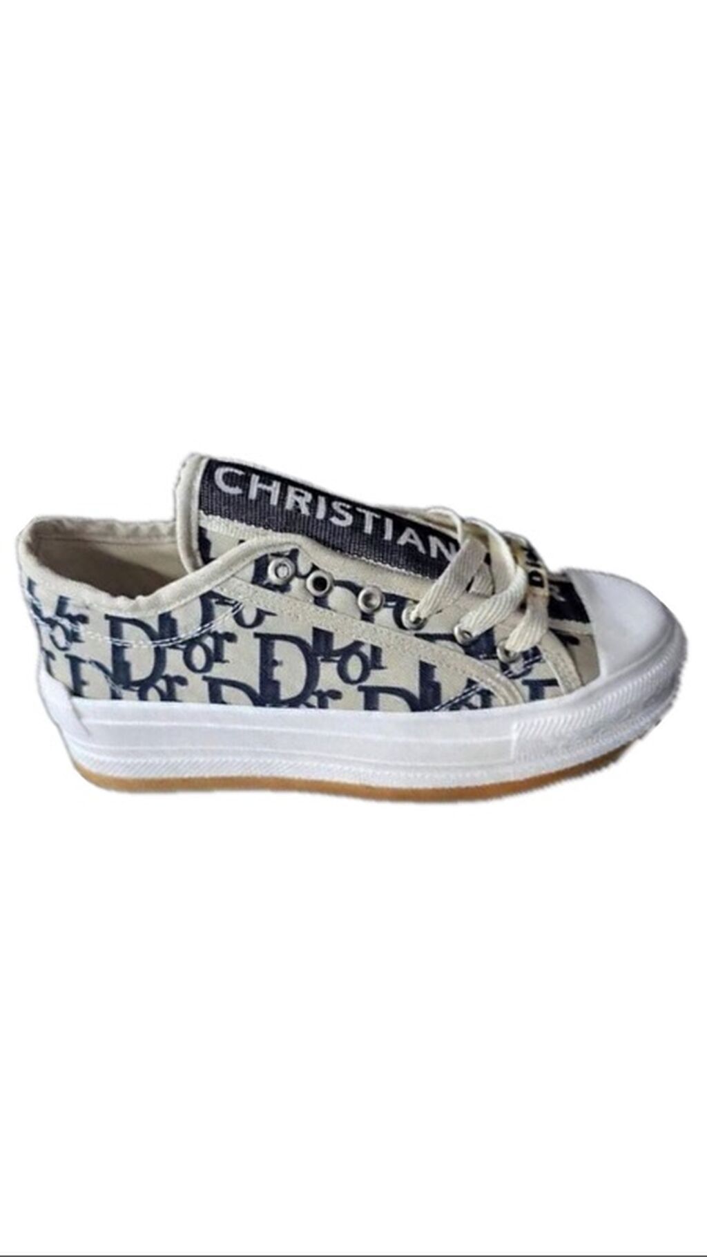 Patike sa monogram printom “Dior” i jezičkom sa natpisom “CHRISTIAN”