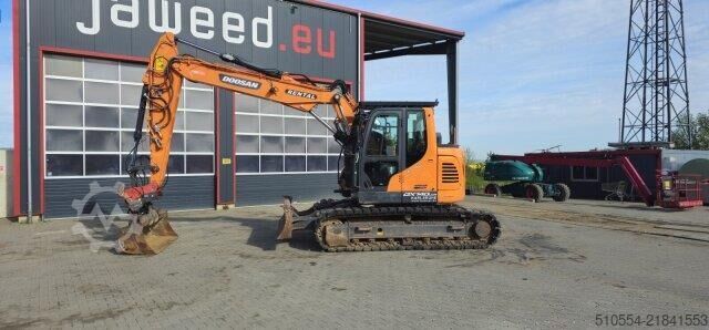 Guseničarski bager
Doosan DX140 LCR-5 / 1.870 Stunde / Top Zustand