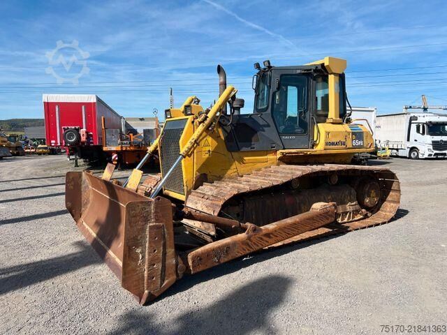Mašina za ocenjivanje
Komatsu D65PX-15 / nur 5.945h / Baujahr: 2004