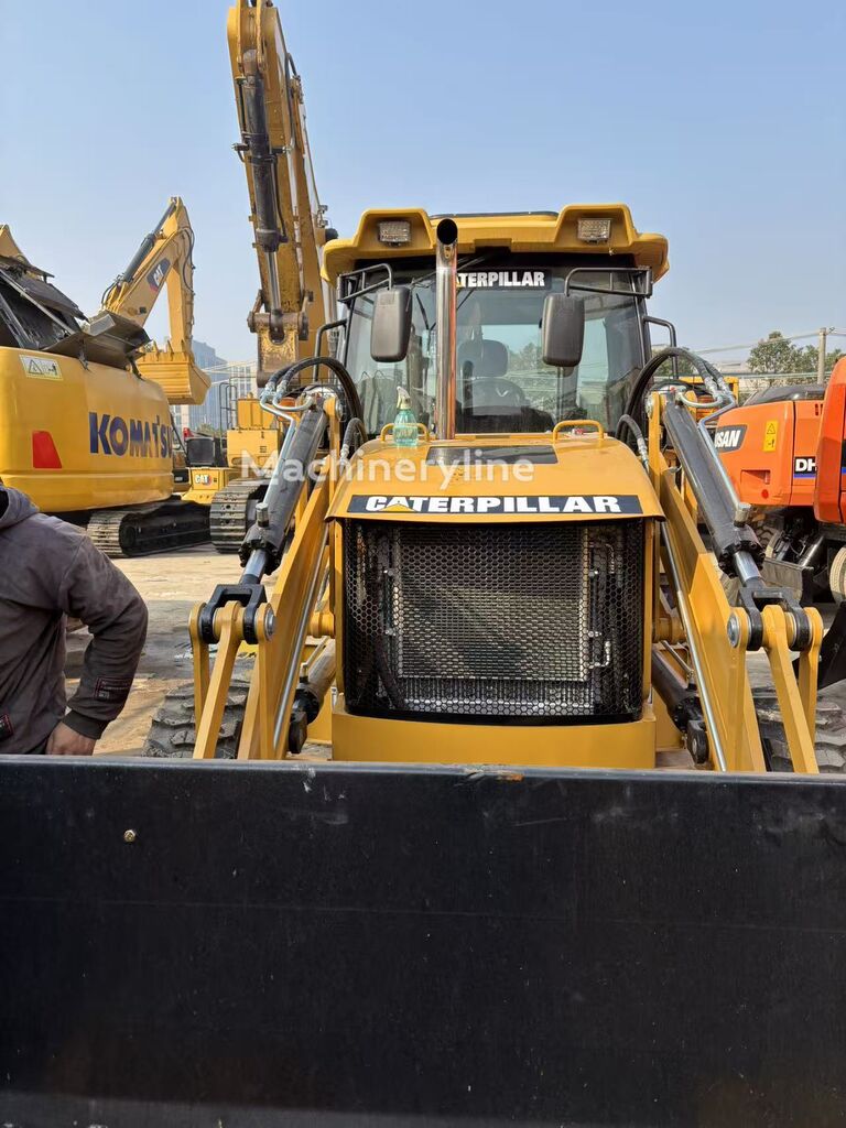 Novi Caterpillar 420F bager-utovarivač