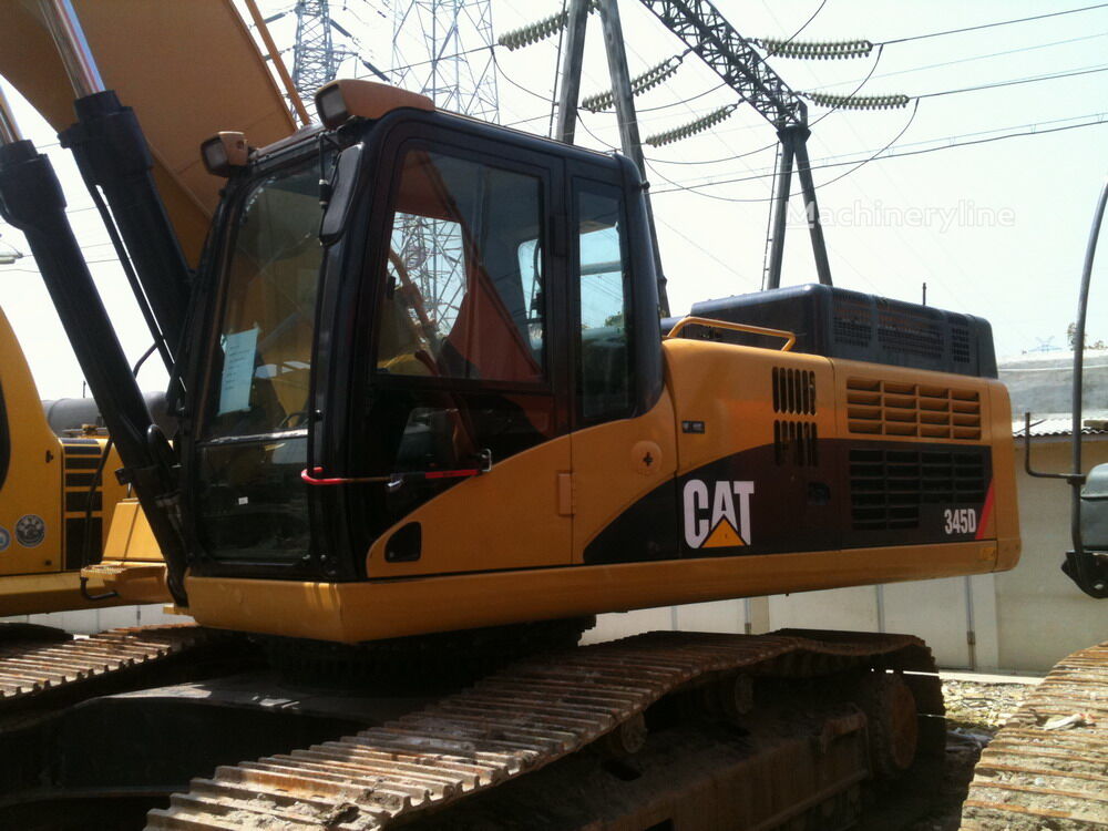 Caterpillar 345D bager guseničar
