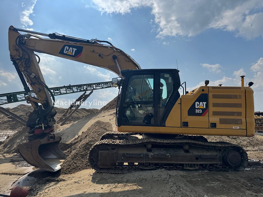 Caterpillar 323 bager guseničar