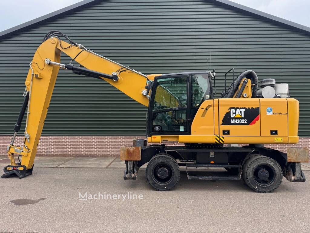 Caterpillar MH 3022 bager za pretovar